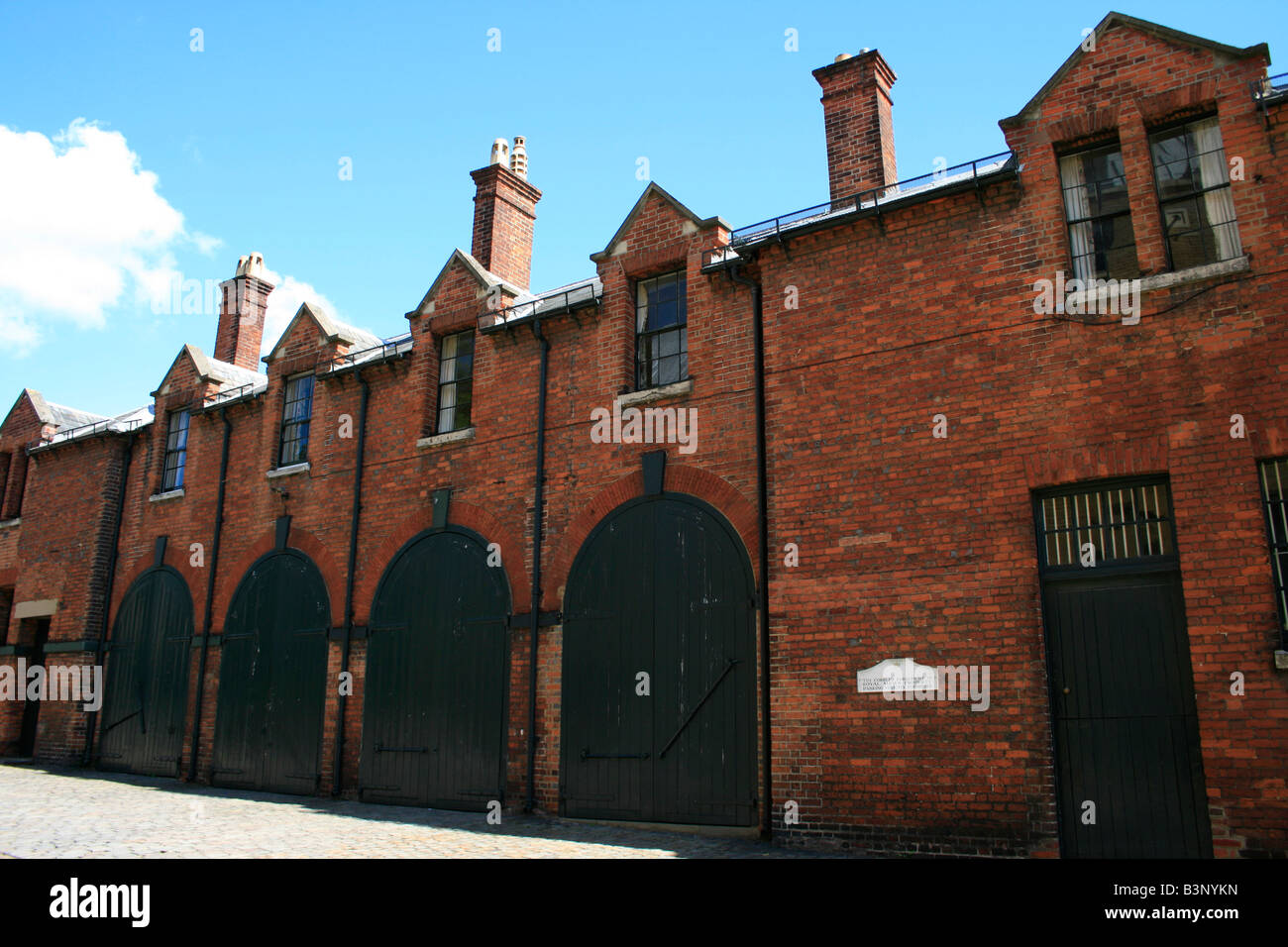 Red brick building housing the Royal Mews of Windsor Stock Photo - Alamy