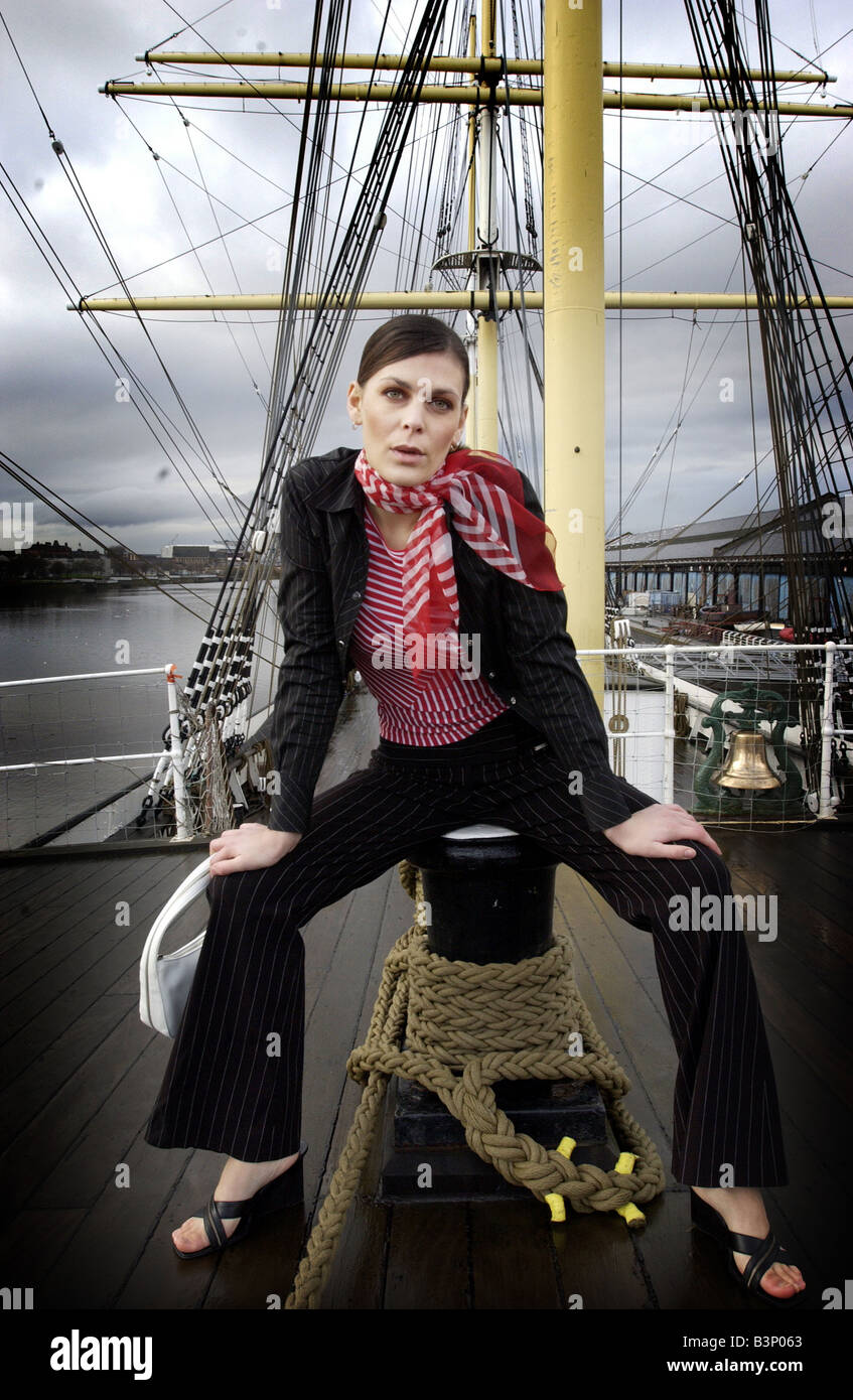 Nautical fashion February 2002 A model wearing black and white striped ...