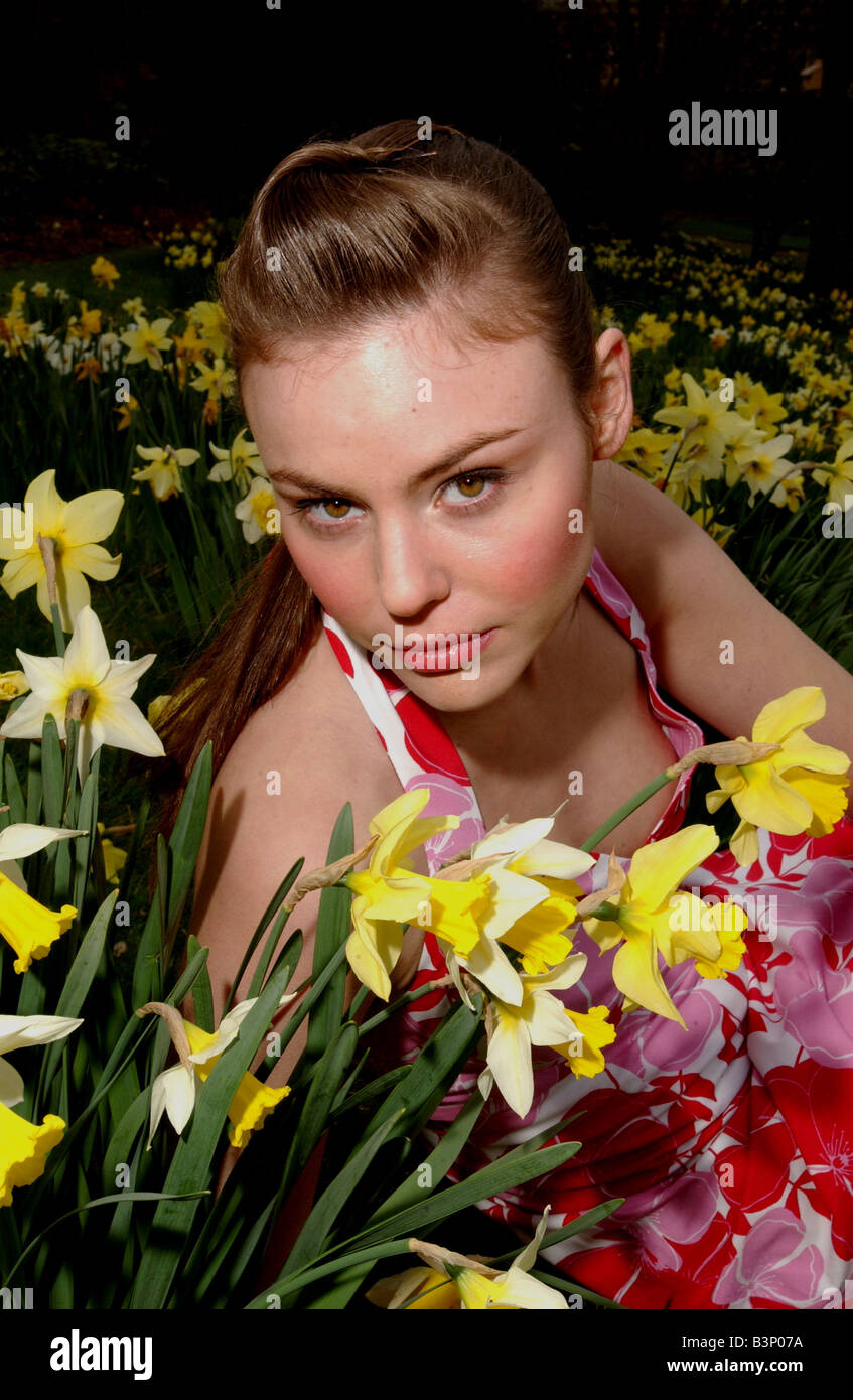 Model Lauren Tempany posing wearing a summer dress amongs a girld of ...