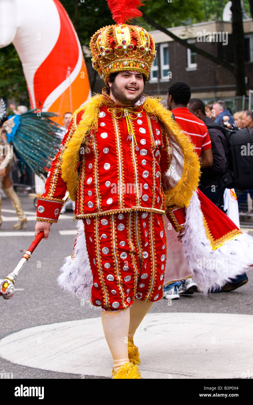 Notting Hill Carnival Parade, bearded teenage young white boy red regal ...