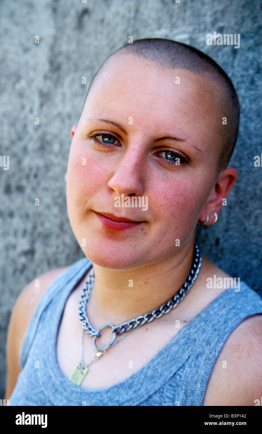 portrait skinhead girl with tatoos and piercings Stock Photo - Alamy