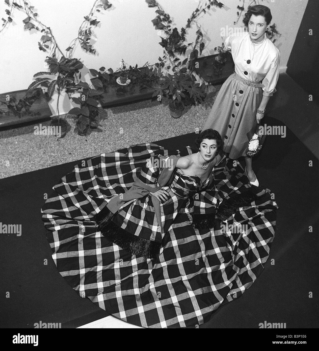 Fashion Cotton Coronation styles Anne Canning model wearing a tartan ...