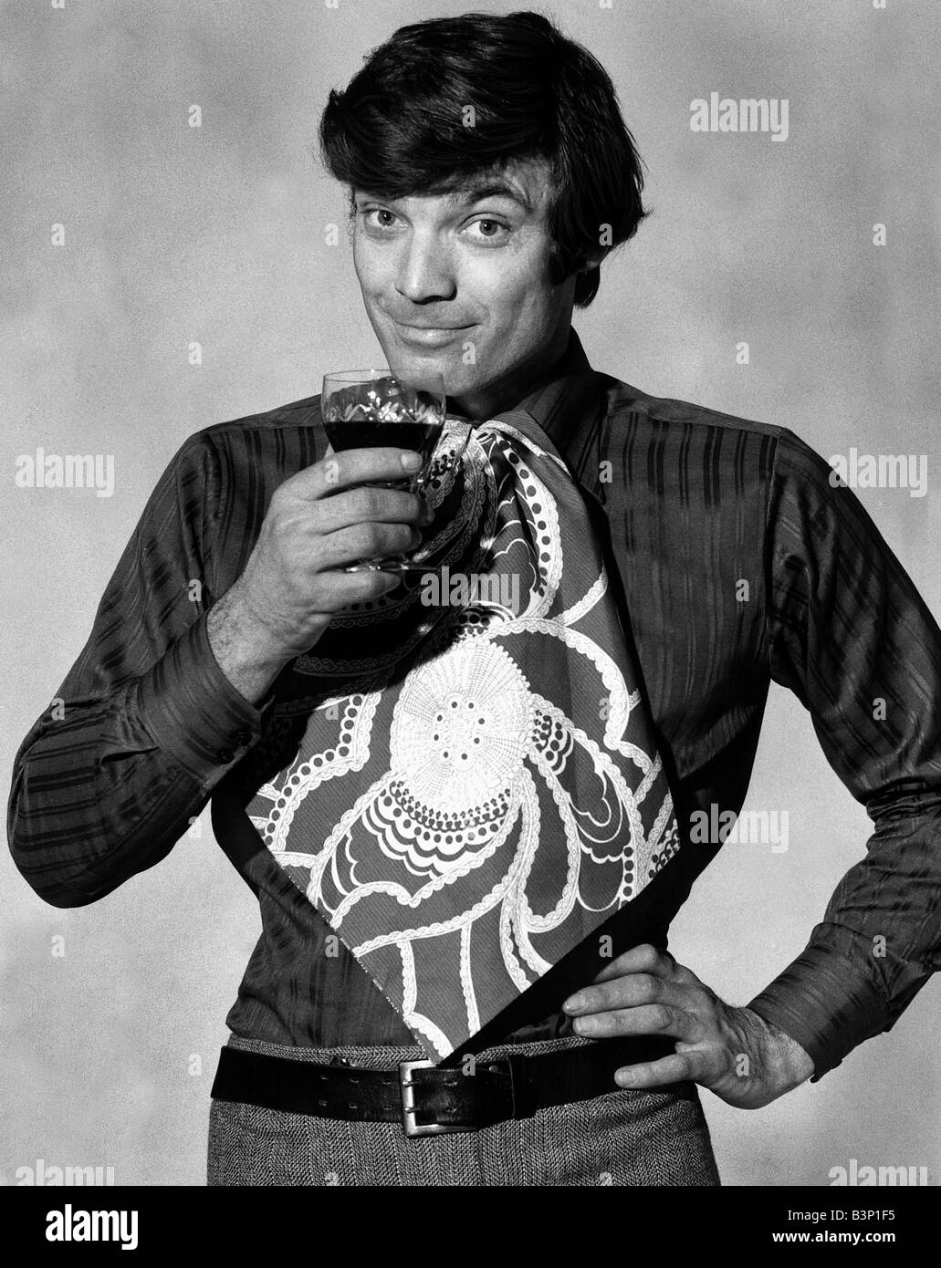 Mens Fashion Bib Tie Man modelling bib tie drinking a glass of wine ...