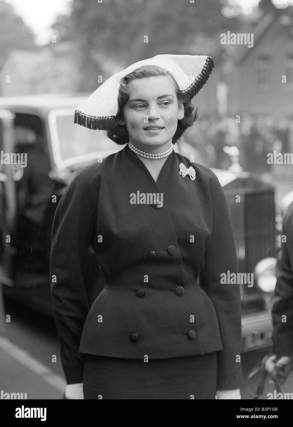 1953 Clothing Ascot Fashion Mrs W Ofner wearing a white fur hat with ...