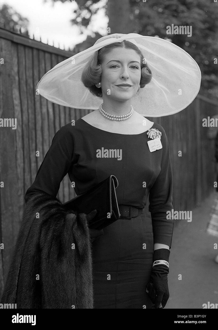 1953 Clothing Ascot Fashion Mrs Douglas Riley Smith wearing a black ...