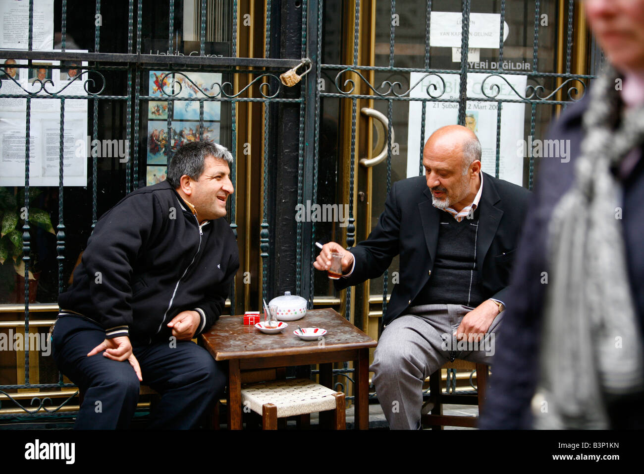 May 2008 - Men having tea in the street Istanbul Turkey Stock Photo - Alamy