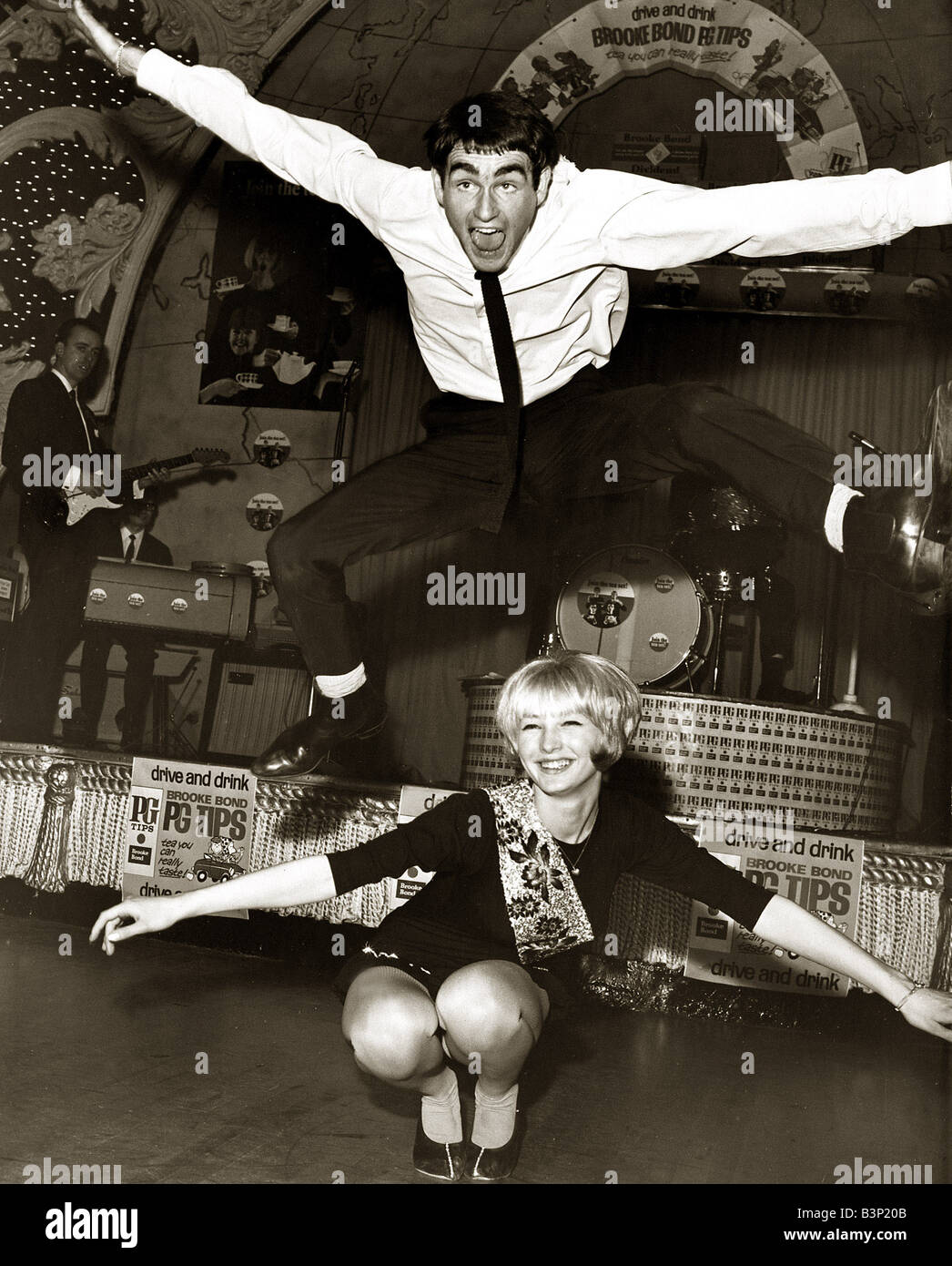 Dances The Twist A couple demonstrate dancing the twist at the Twist ...