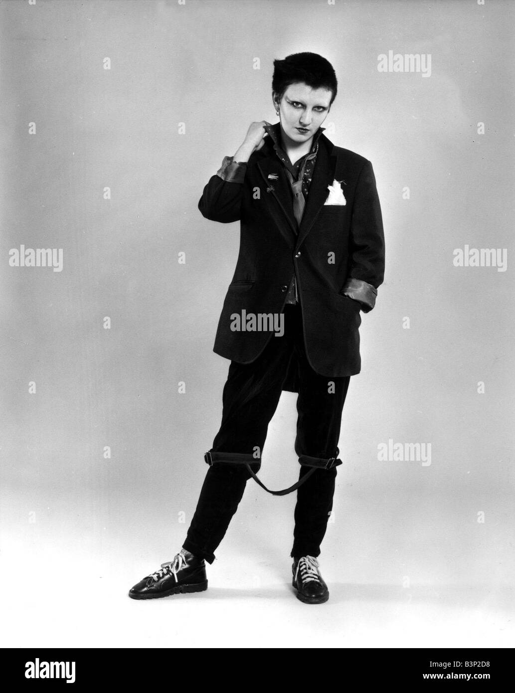 Punk rocker fashion Black jacket and trousers dyed black hair Stock ...