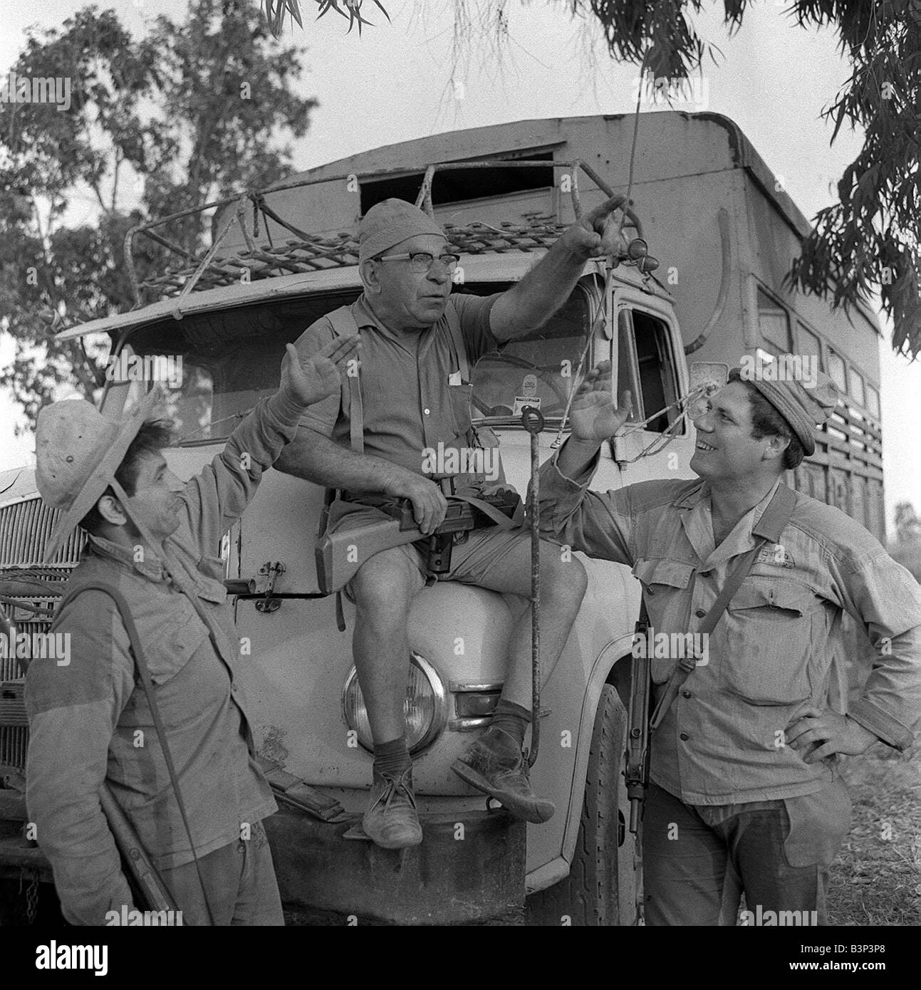 Three soldiers sitting hi-res stock photography and images - Alamy