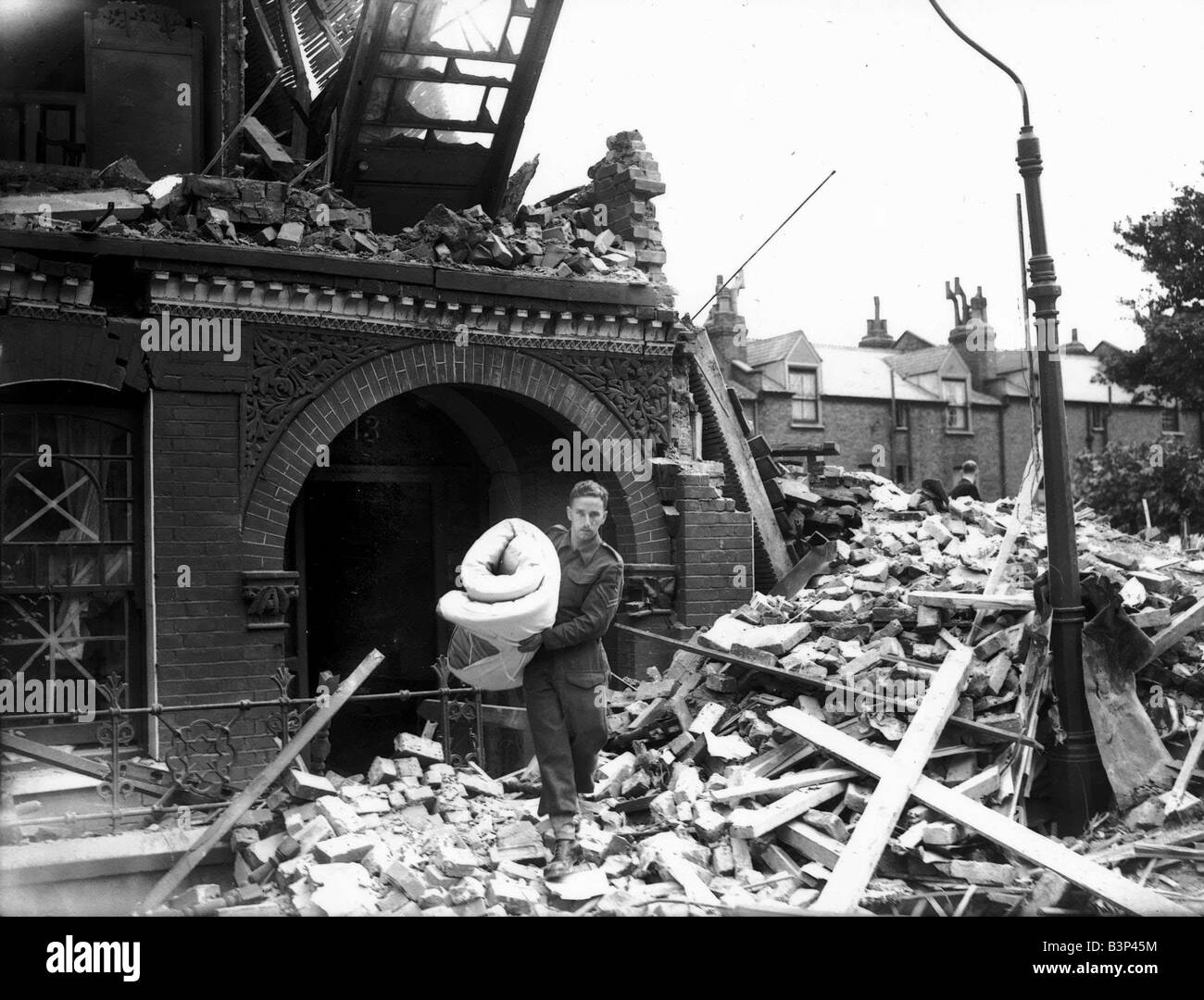 WW2 Air Raid Damage Tooting Bomb damage at Tooting London A soldier ...