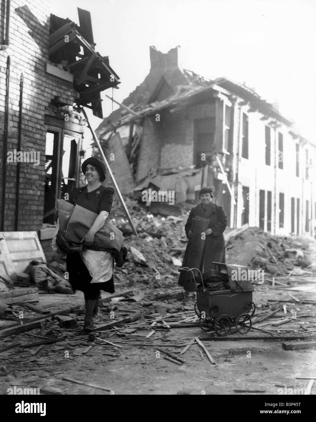 WW2 Air Raid Damage Bomb damage in Newcastle Civilians walk along the ...