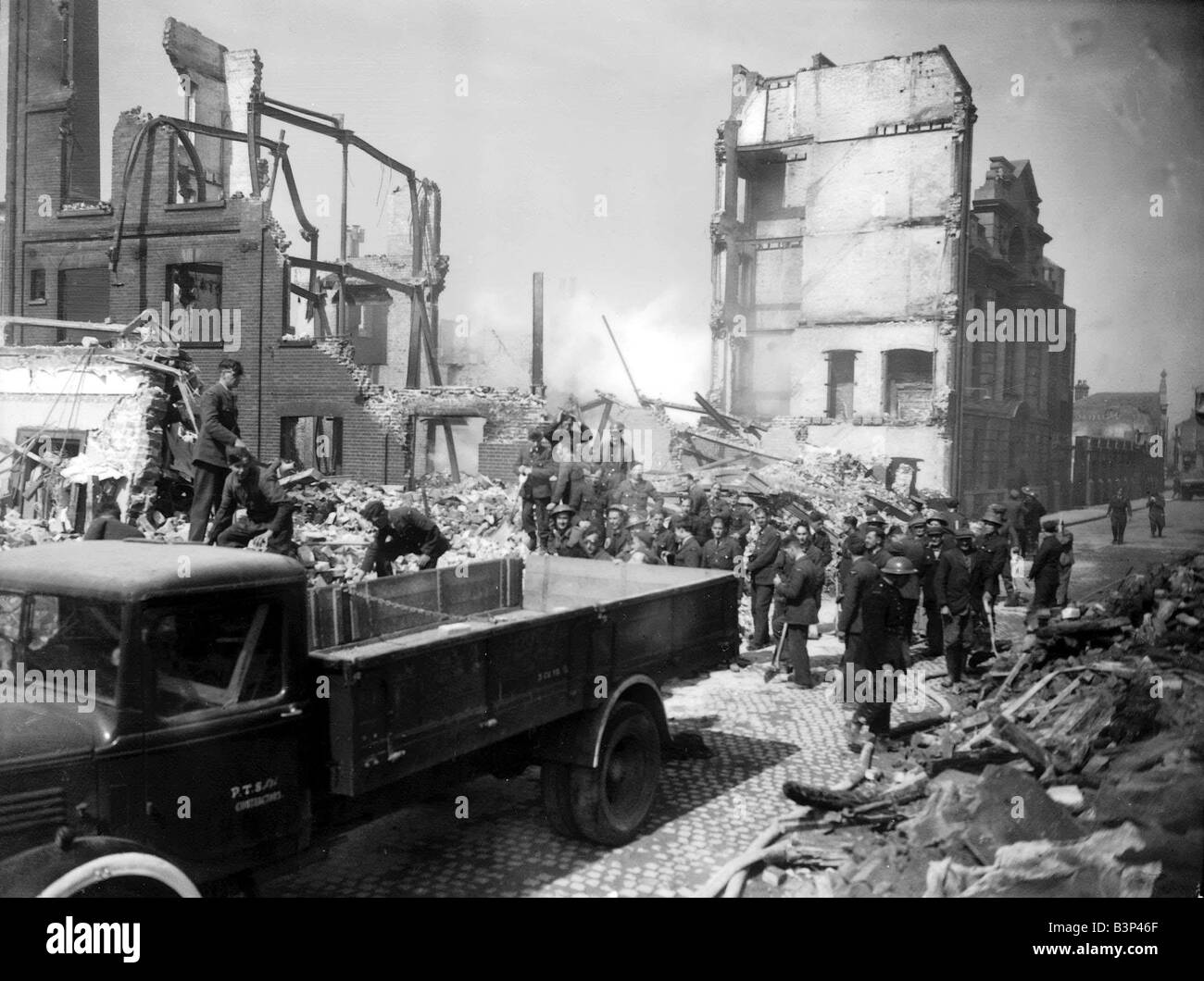 WW2 Air Raid Damage Norwich Bomb damage at Norwich Rescue workers at a ...