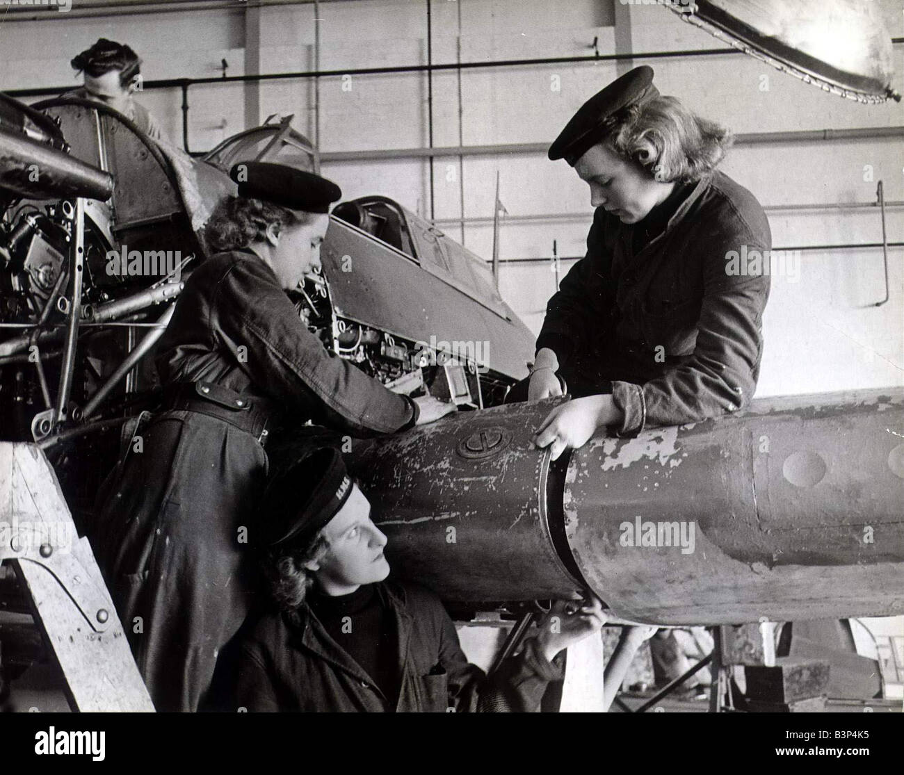 Air Maintenance Wrens at work on Fleet air fighter planes assembling an ...