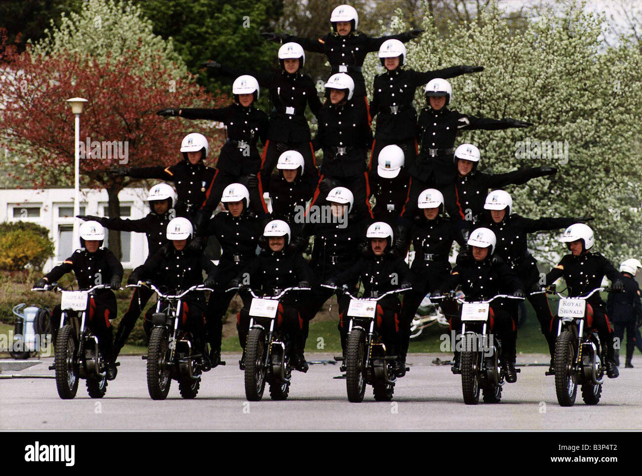Army Regiment Royal Signals White Helmets performing a human pyramid ...