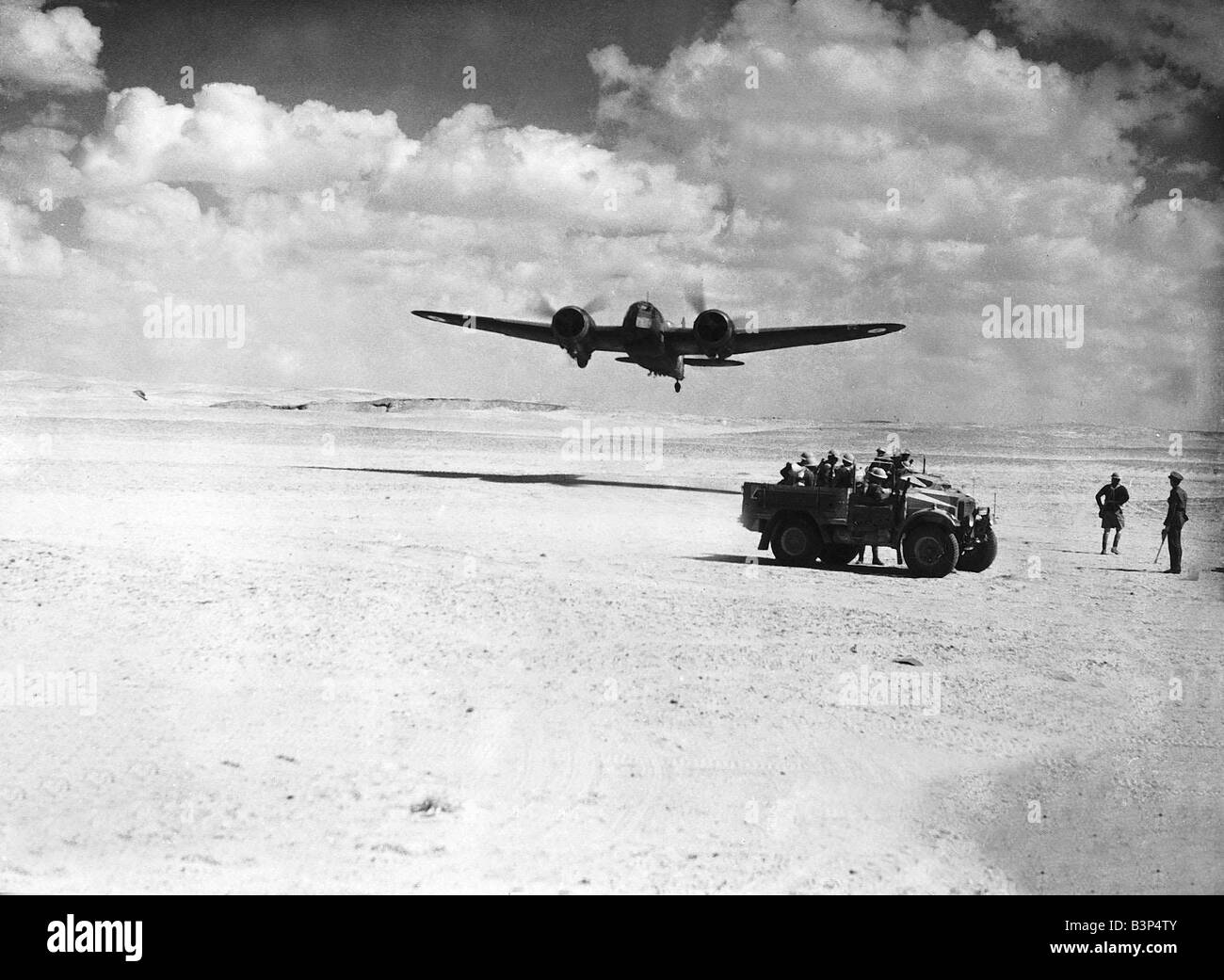 RAF Middle East Command plane and British desert patrol during WW2 in ...