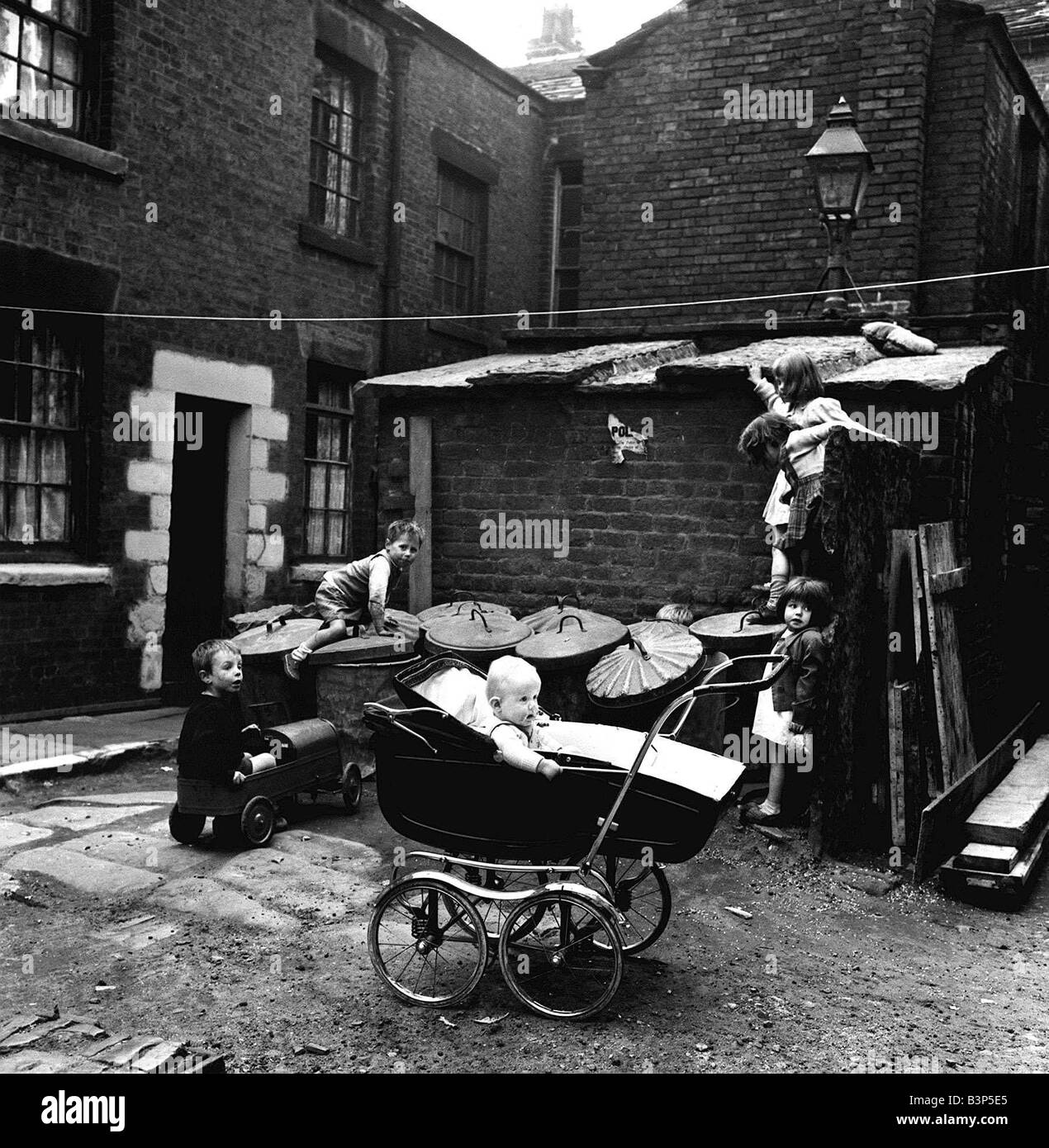 Taken from a set of pictures showing slum housing in post war Britain ...