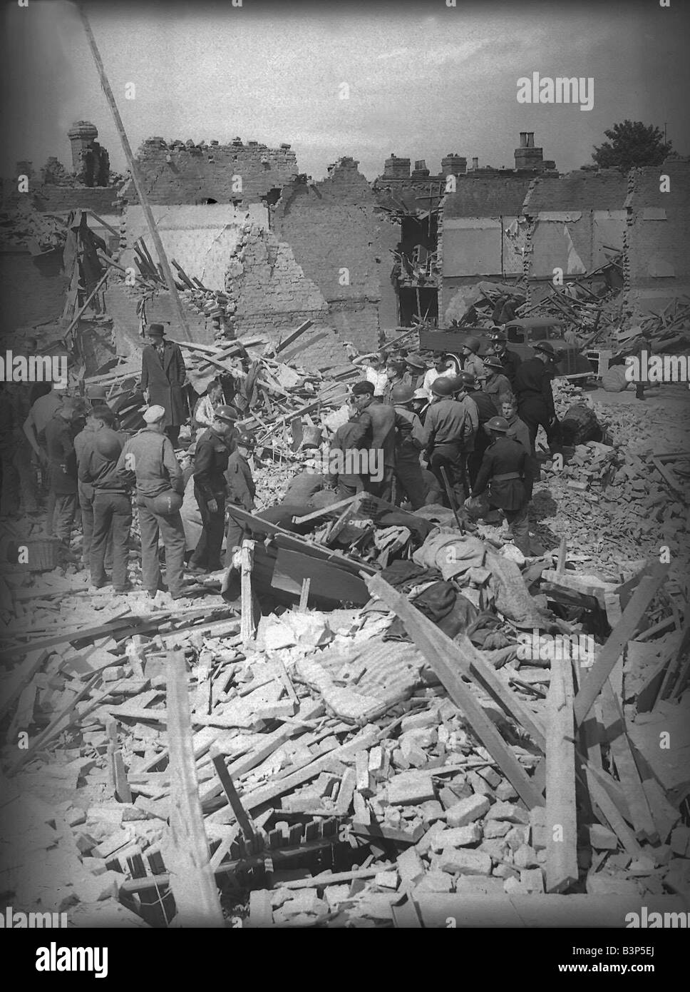 Bomb Damage after air raid damage Deptford WW2 wardens and local people ...