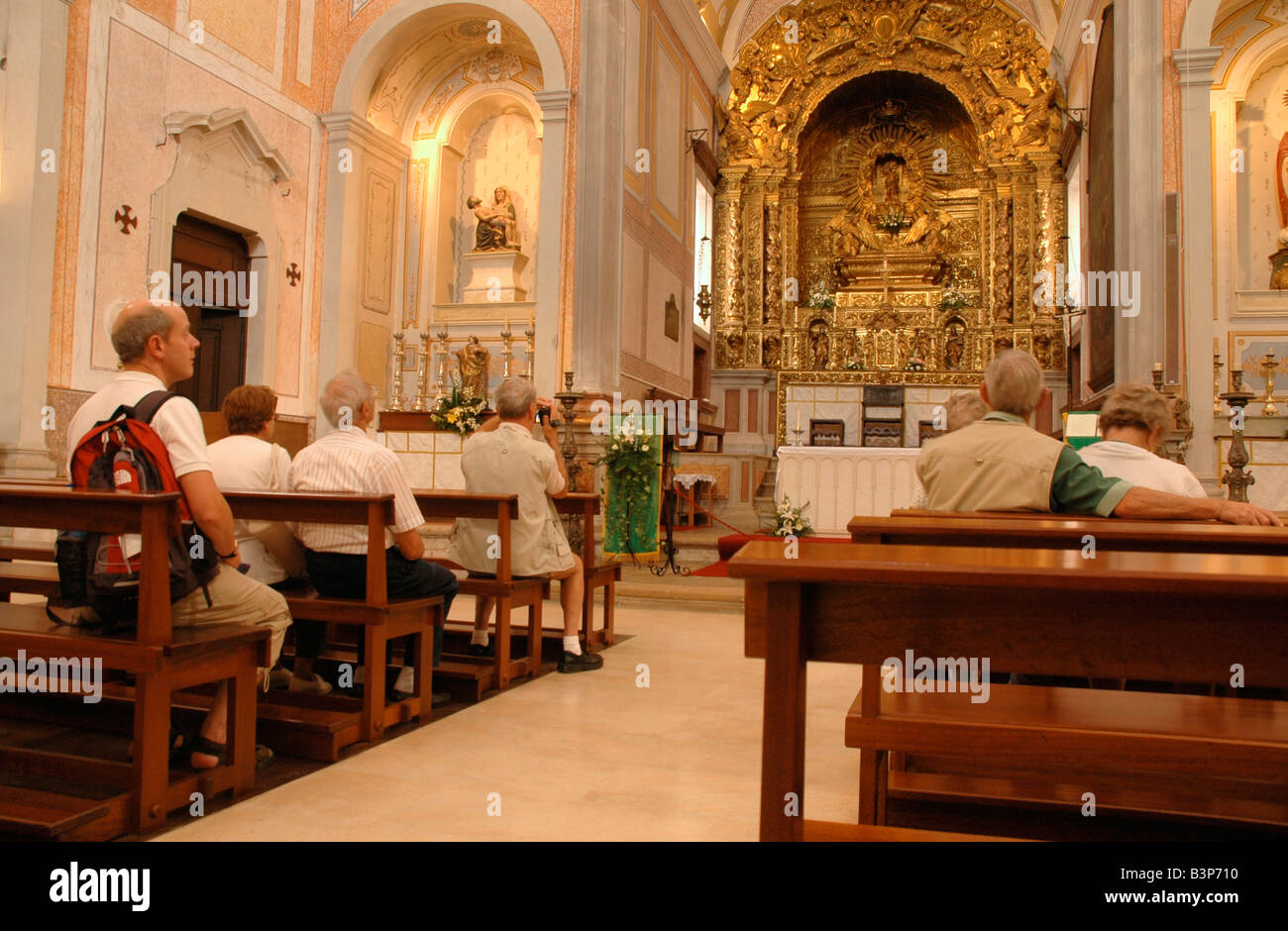 Worshipers in catholic church hi-res stock photography and images - Alamy