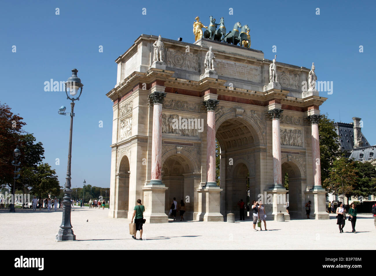 The Arc de Triomphe du Carrousel on the Place du Carrousel in Paris ...