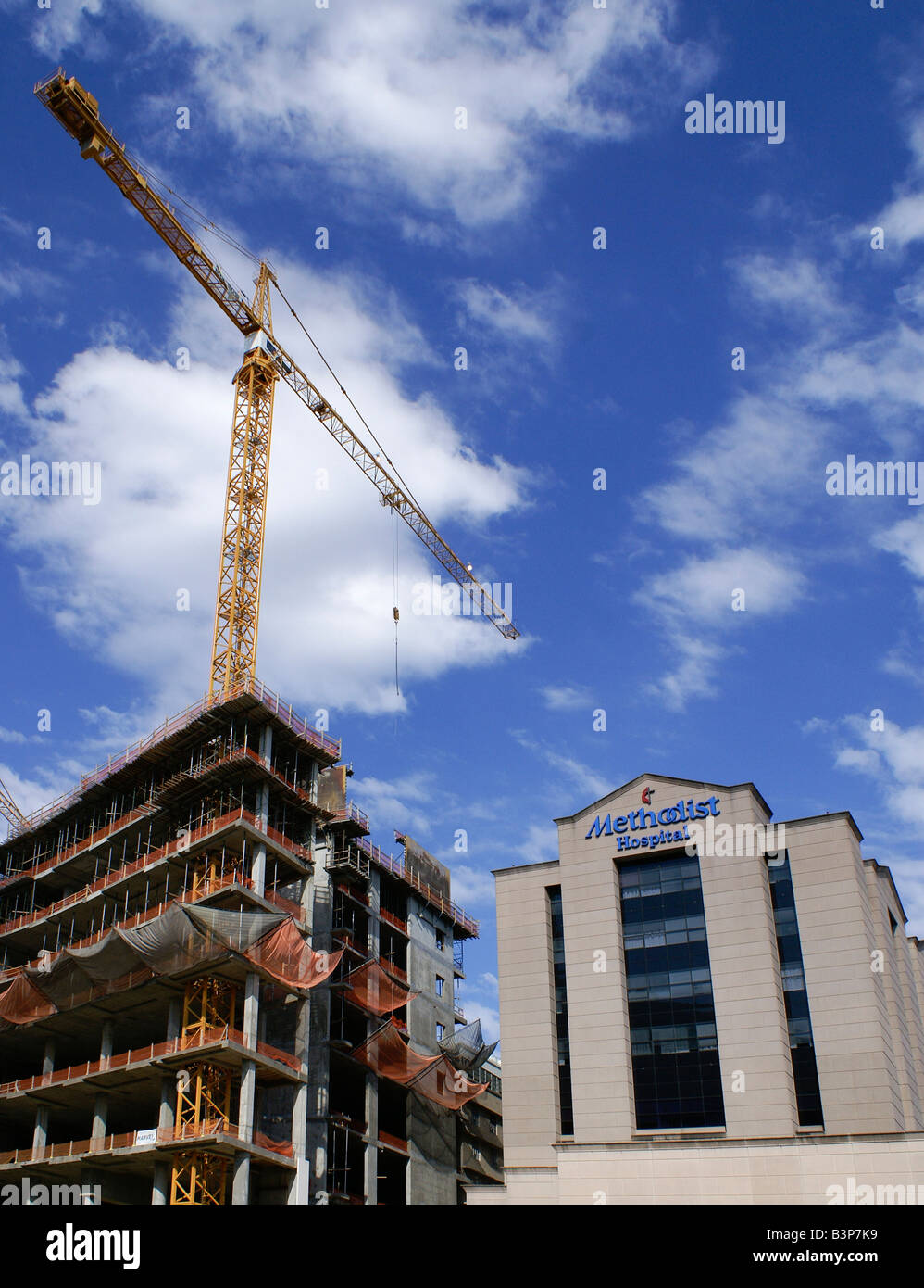 Large lifting cranes used for building construction Stock Photo - Alamy