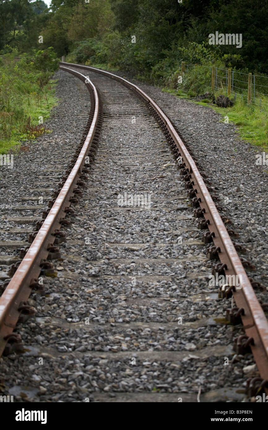 A railtrack in County Durham, England. The rails curve to the left ...