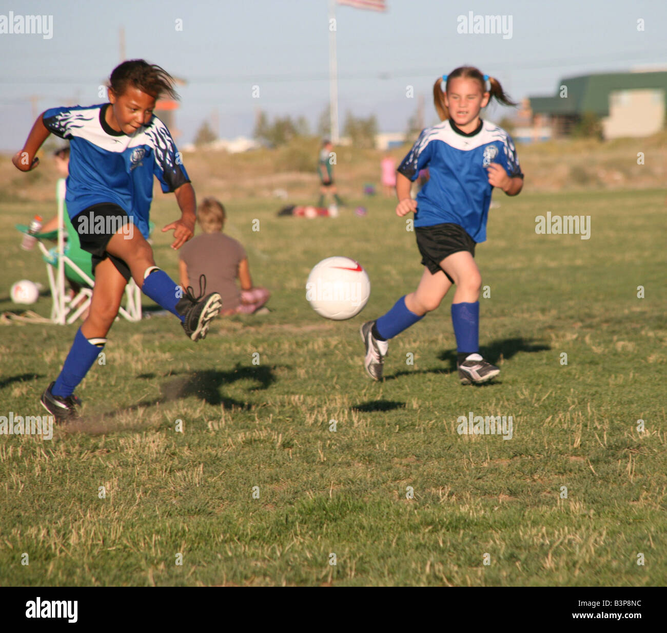 Girls soccer kick hi-res stock photography and images - Alamy