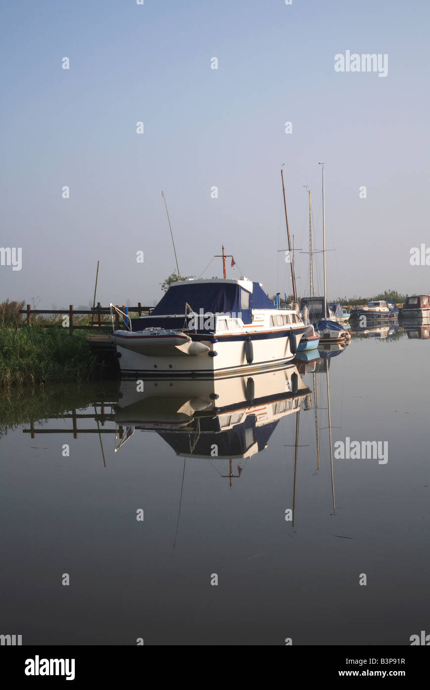 Boats moored in Hardley Dike off the River Yare, Norfolk, UK, early ...