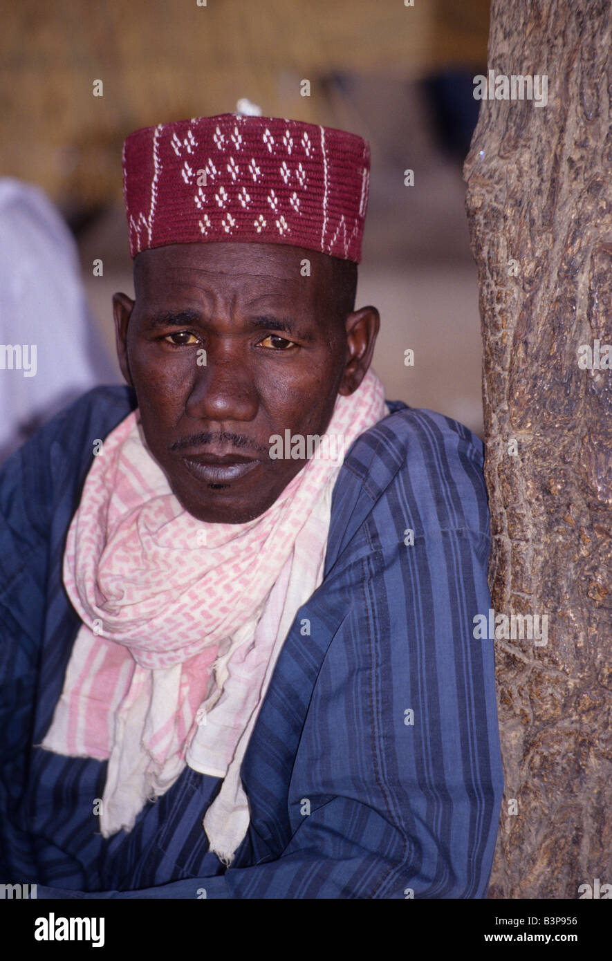 Zinder, Niger, West Africa. Hausa Man in Blue Boubou, Maroon Hat Stock ...