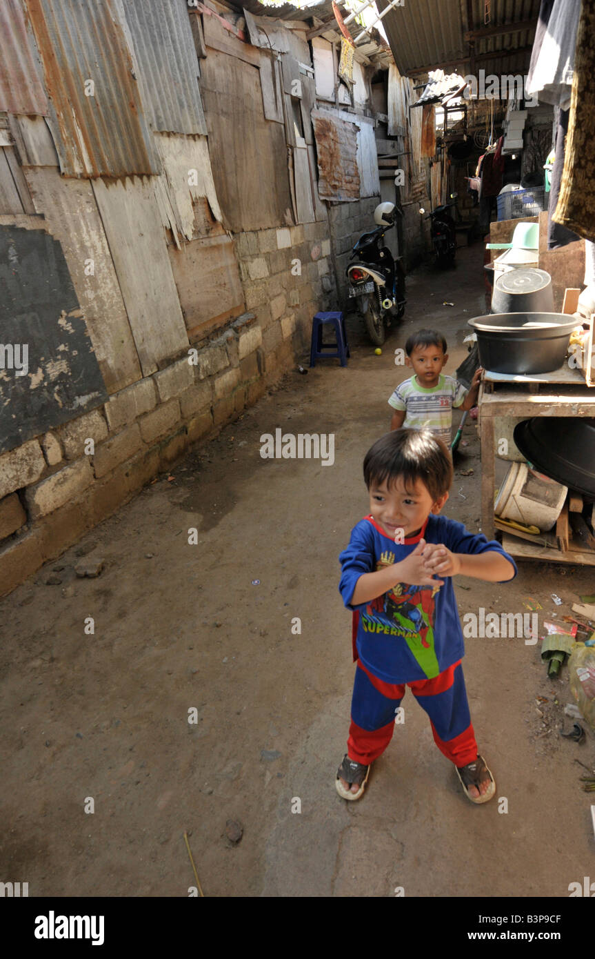 slum in backstreets of kuta(behind paradise), poor slum children ...