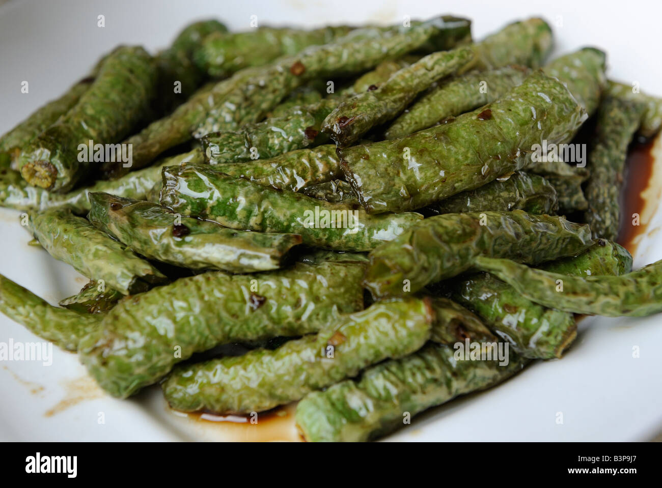 Sauteed Green Chili Pepper in Chengdu, Sichuan, China. Sep 2008 Stock ...