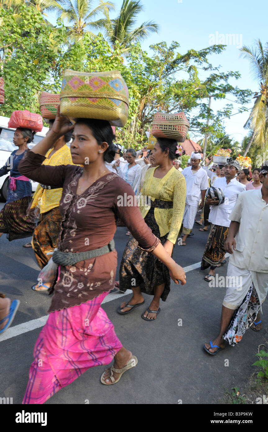 street procession heading towards village temple, sawah village ...