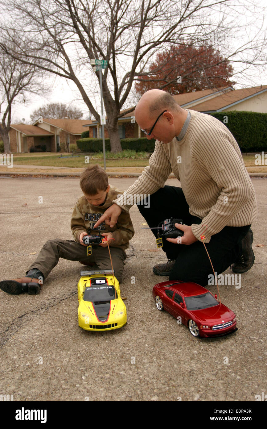 father and son racing remote control cars Stock Photo - Alamy