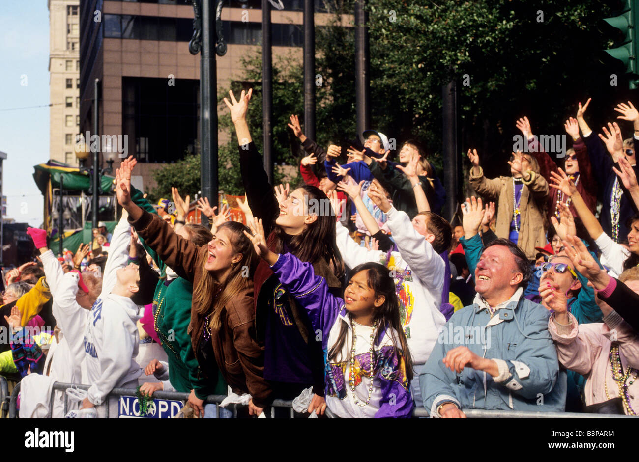 New Orleans Louisiana Mardi Gras carnival festival parade. Crowd on the ...