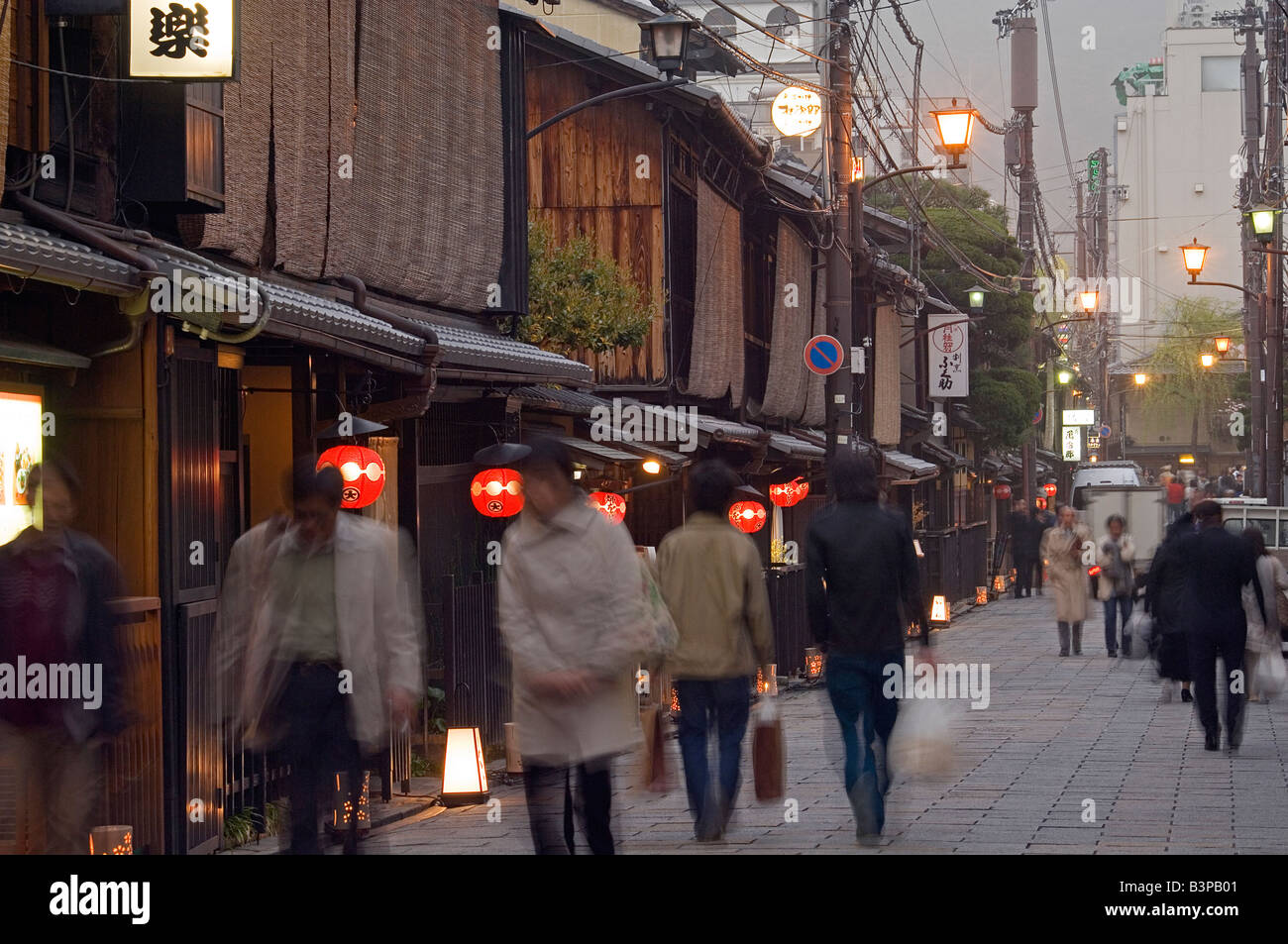 Japan. People taking evening stroll in eastern tea house area Stock ...