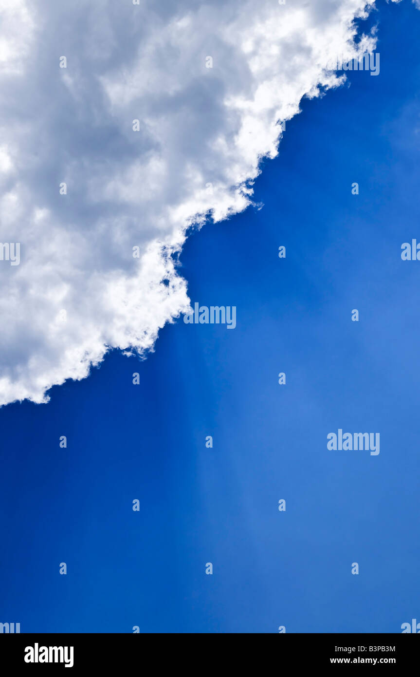 Sunrays from behind clouds hi-res stock photography and images - Alamy