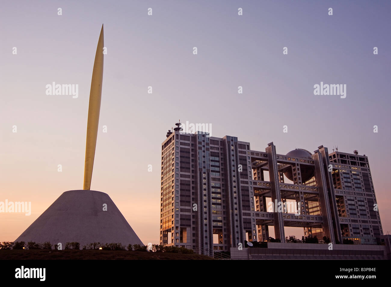 Japan, Tokyo, Odaiba . The Flame of the Liberty Gold Needle and the ...