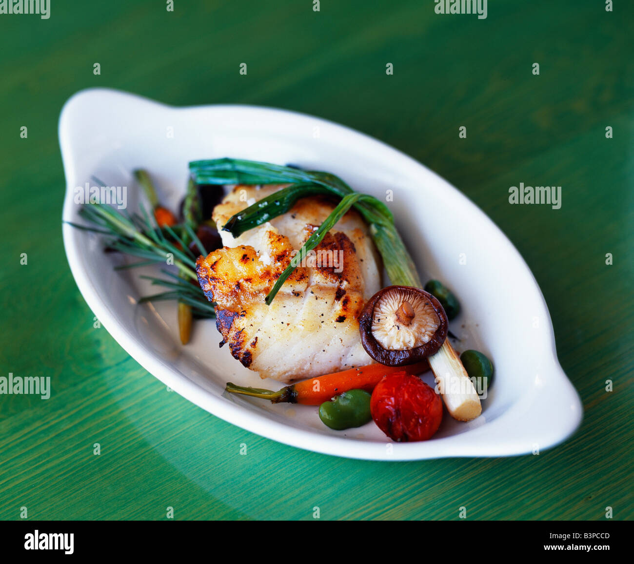 Chile, Atacama Desert, San Pedro de Atacama. Fish main course at the ...