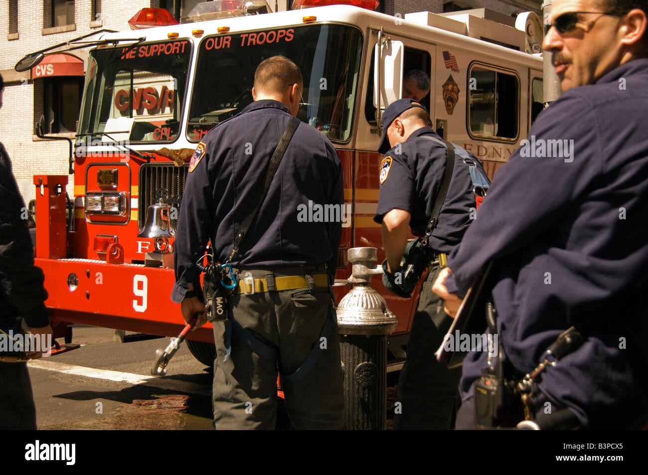 Fire Truck and firemen in New York City, America USA Stock Photo - Alamy