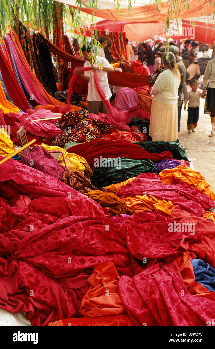 China, Xinjiang Uigur Autonomous Region, Kashgar. Bolts of vibrant ...