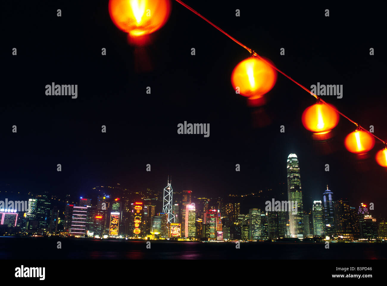 China, Hong Kong, Tsim Sha Tsui. Chinese lanterns light the promenade ...