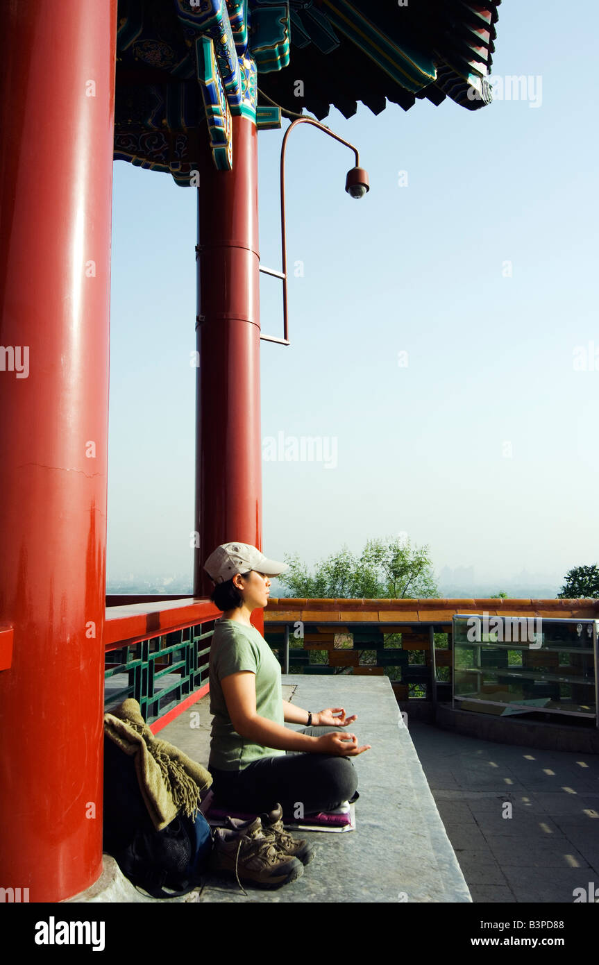Reiki Healer, Regina Wei (MR), practising Yoga in the early morning at ...