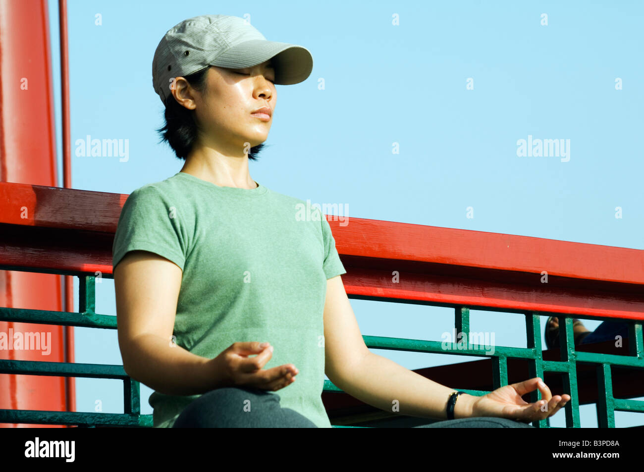 Reiki Healer, Regina Wei (MR), practising Yoga in the early morning at ...