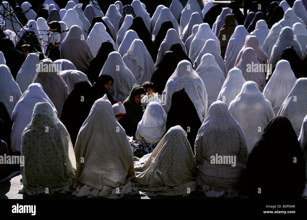Iran, Shiraz. Women praying Stock Photo - Alamy