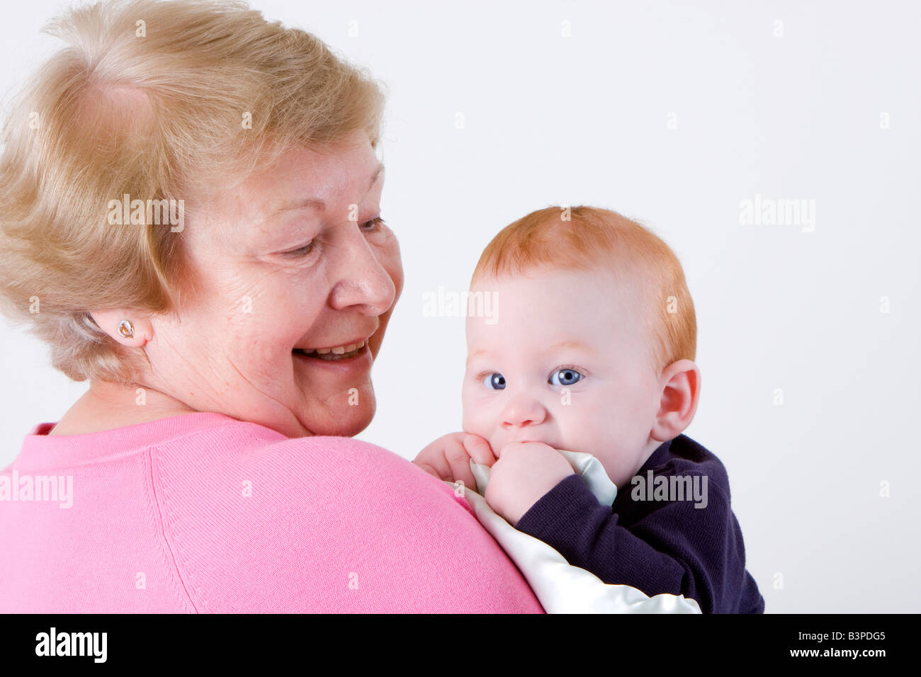 Grandparent holding grandson baby infant hi-res stock photography and ...