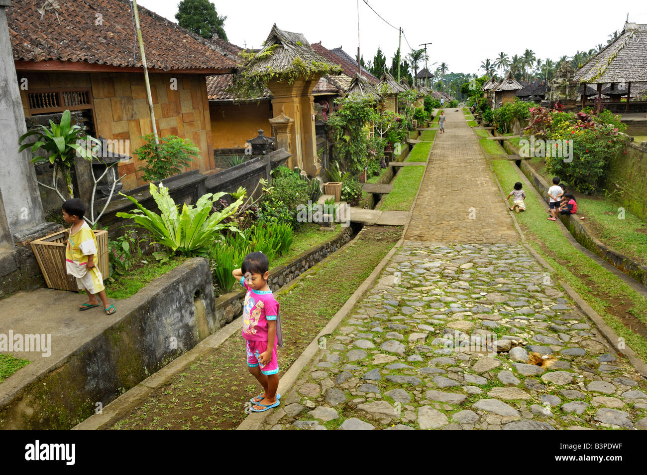 Traditional village, main street, children in Bangli, Bali, Indonesia ...