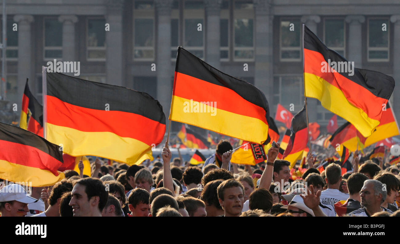 Soccer fans celebrating the German national soccer team with a sea of ...