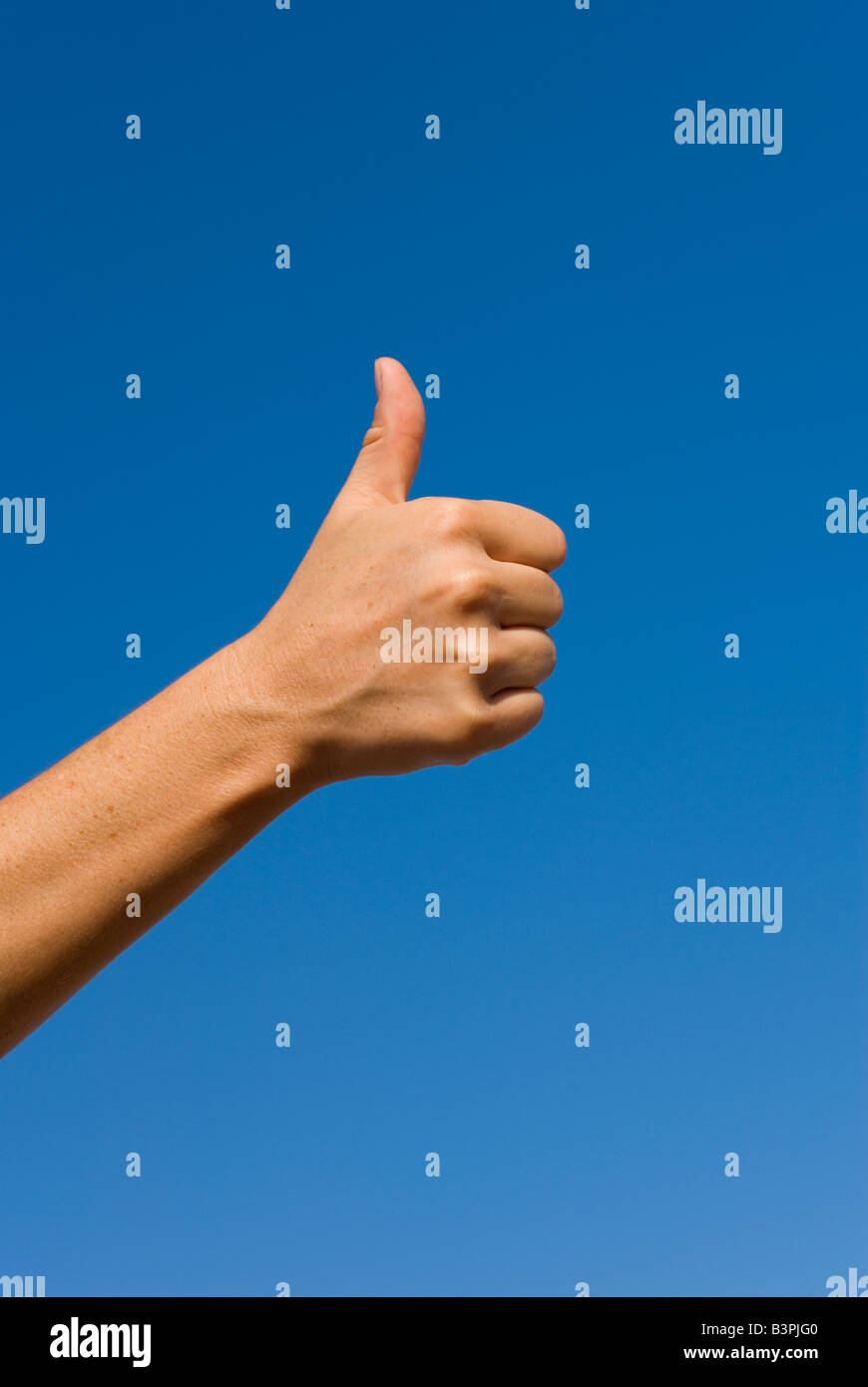 Woman making thumbs up sign hi-res stock photography and images - Alamy