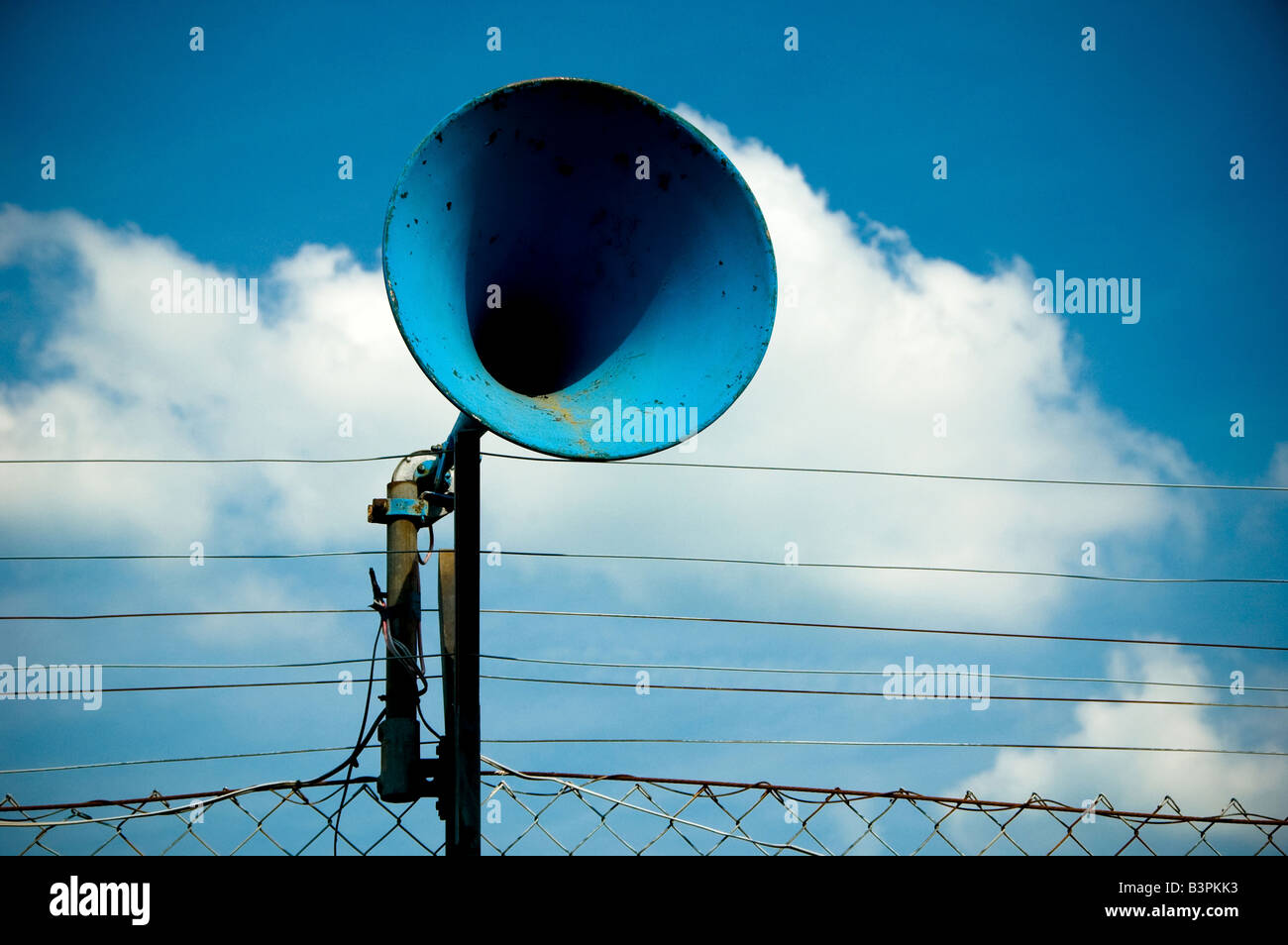 Public address system on race track fence Stock Photo - Alamy