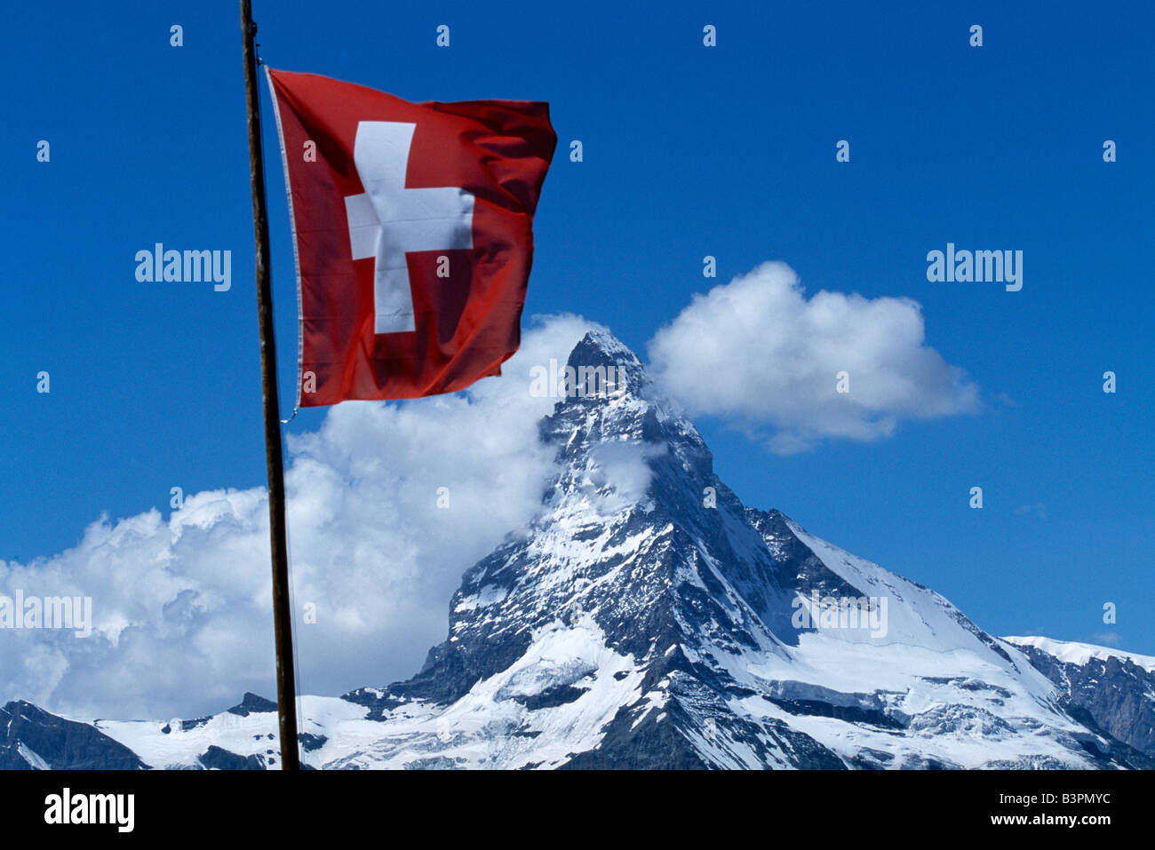 Swiss flag in front of the Matterhorn, Zermatt, Valais, Switzerland ...