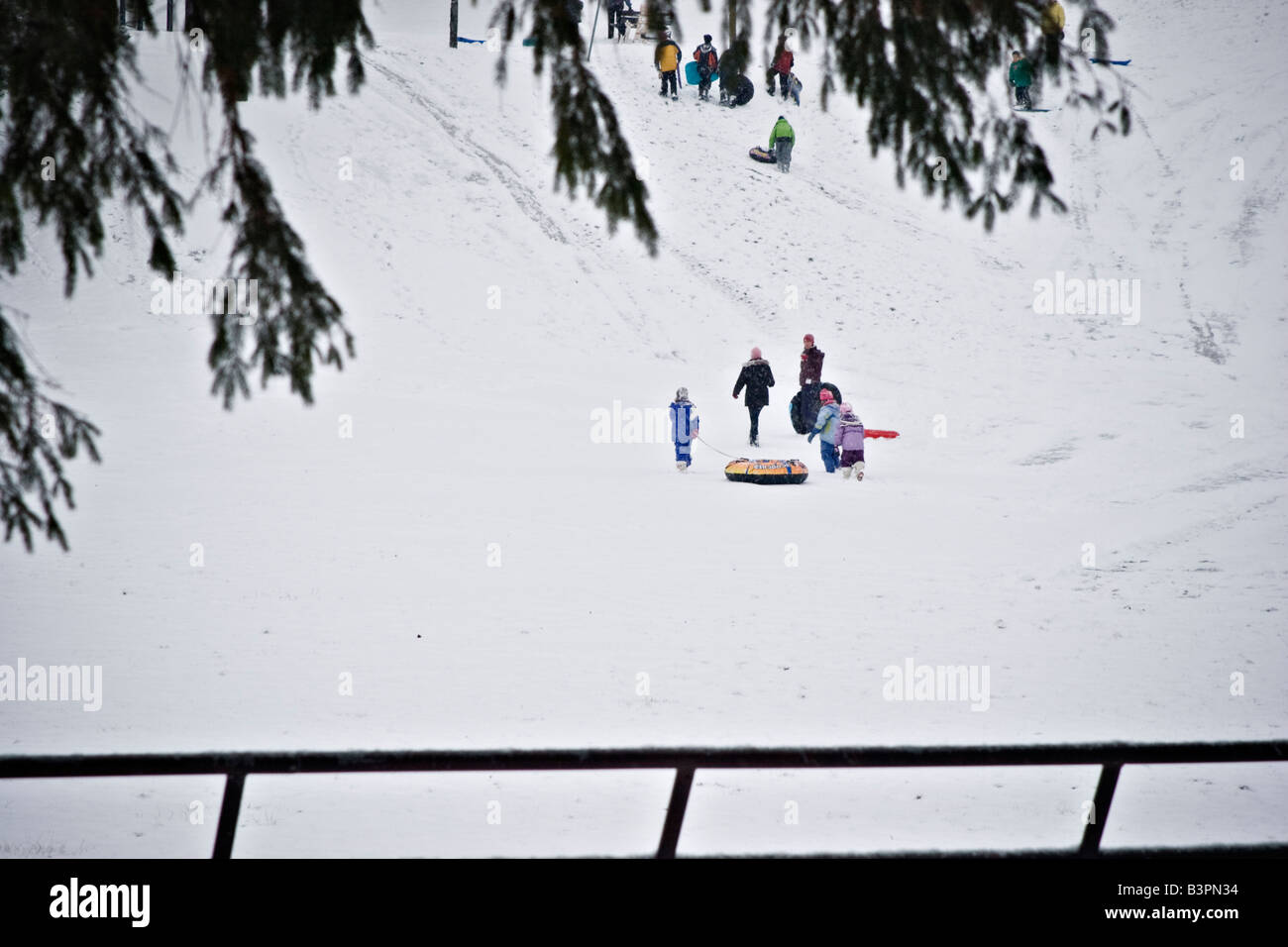 Winter scene of people enjoying the snow outdoor Stock Photo - Alamy